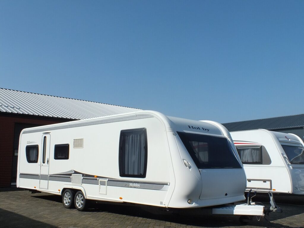 HOBBY Prestige 695 VIP bj.2012, met QUEENSBED, VOORTENT